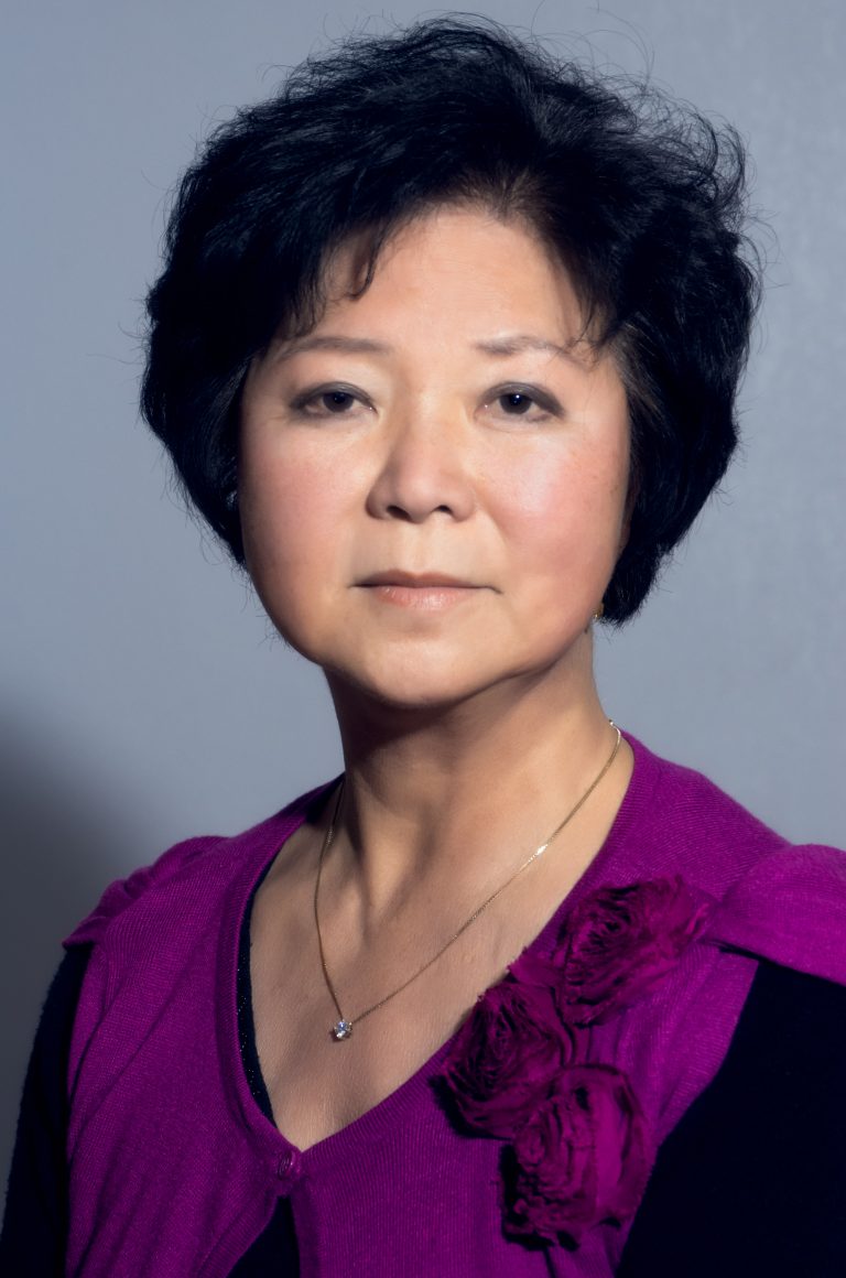 The legendary Ann Woo (胡琼君)